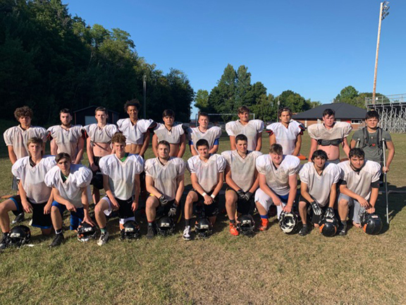 Passing on the baton: Munising has new varsity football coach, but in ...